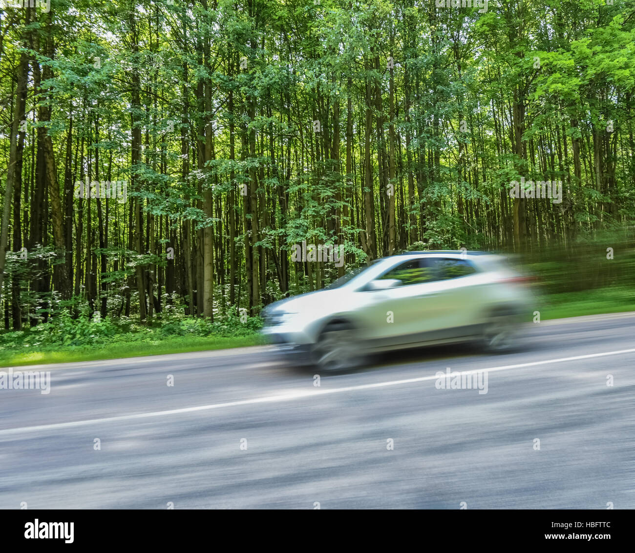 Speeding race cars hi-res stock photography and images - Alamy
