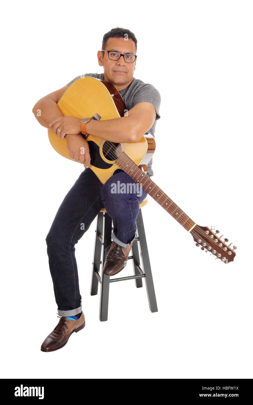 Man holding instrument hi-res stock photography and images - Alamy