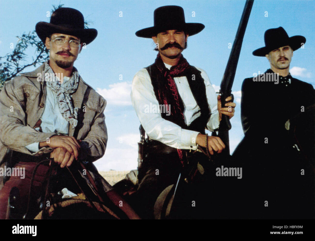 TOMBSTONE, from left, Jason Priestley, Kurt Russell, Val Kilmer, 1993 ...