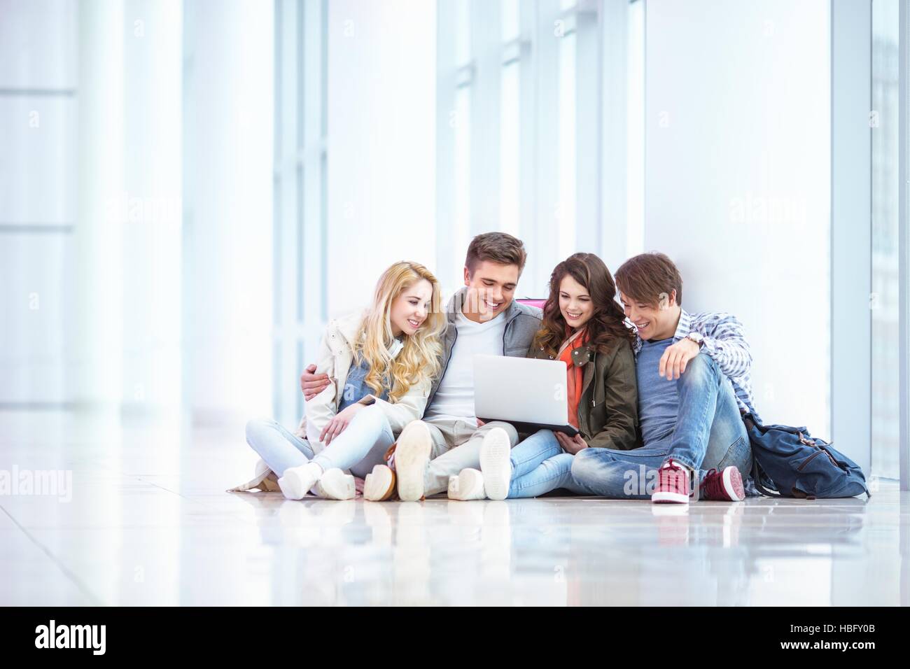 Students with laptop Stock Photo - Alamy