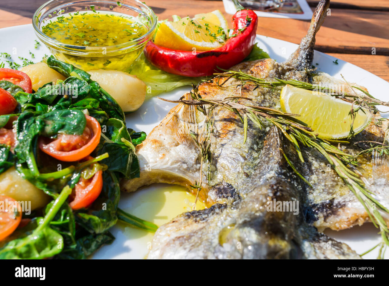 Fresh fish grilled sea bream Stock Photo - Alamy
