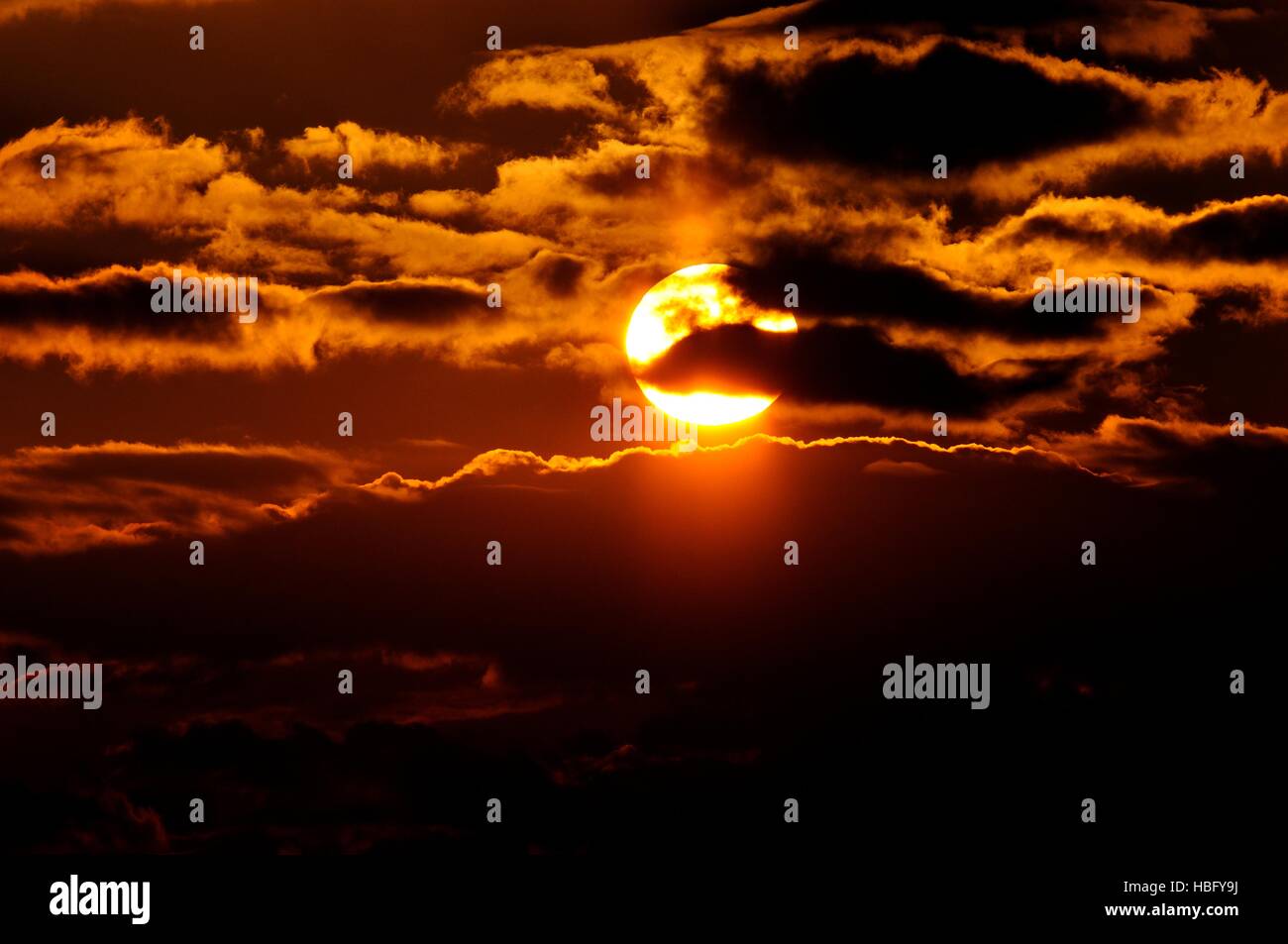 The sun is hiding behind the cloud hi-res stock photography and images ...