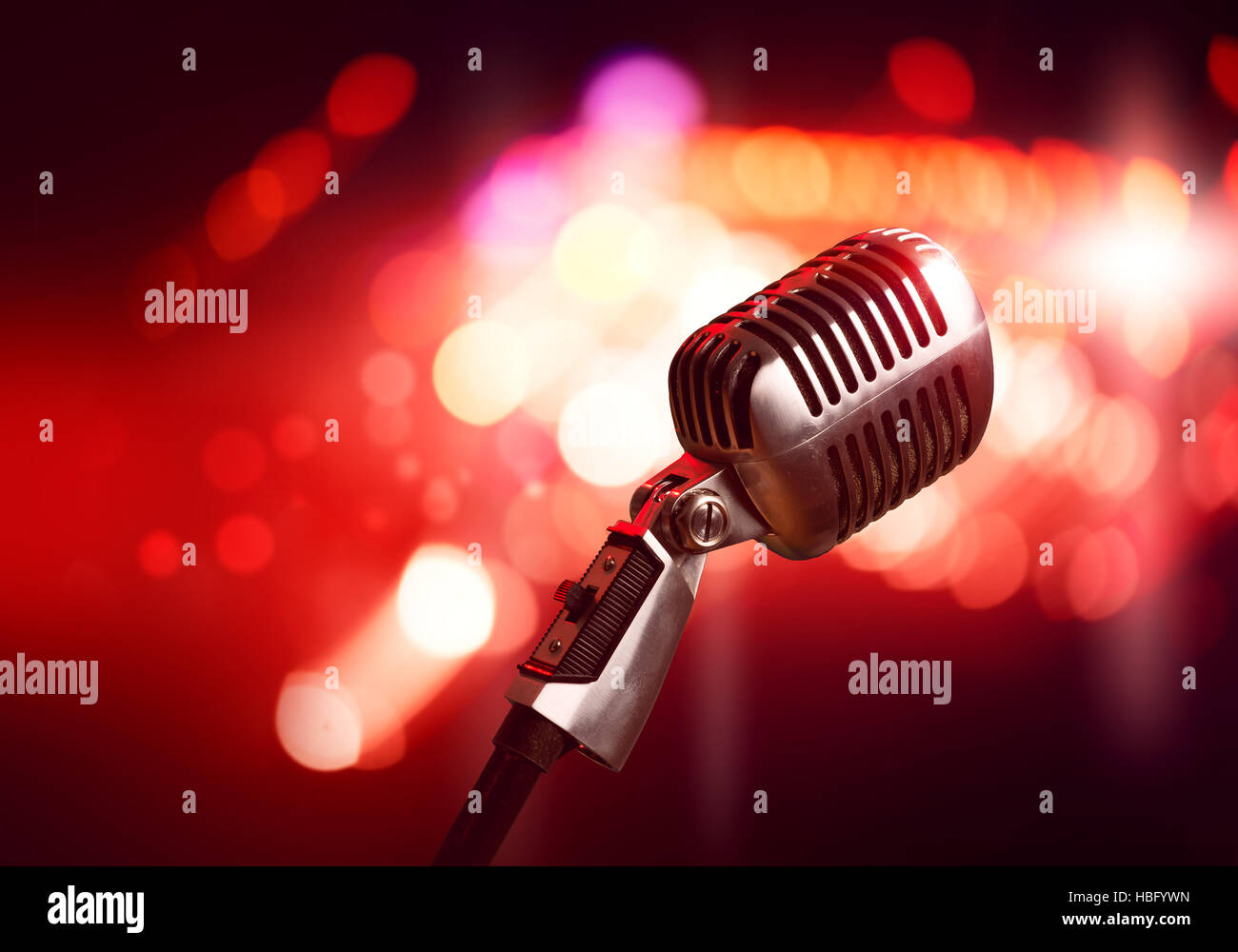 Microphone on stage Stock Photo - Alamy