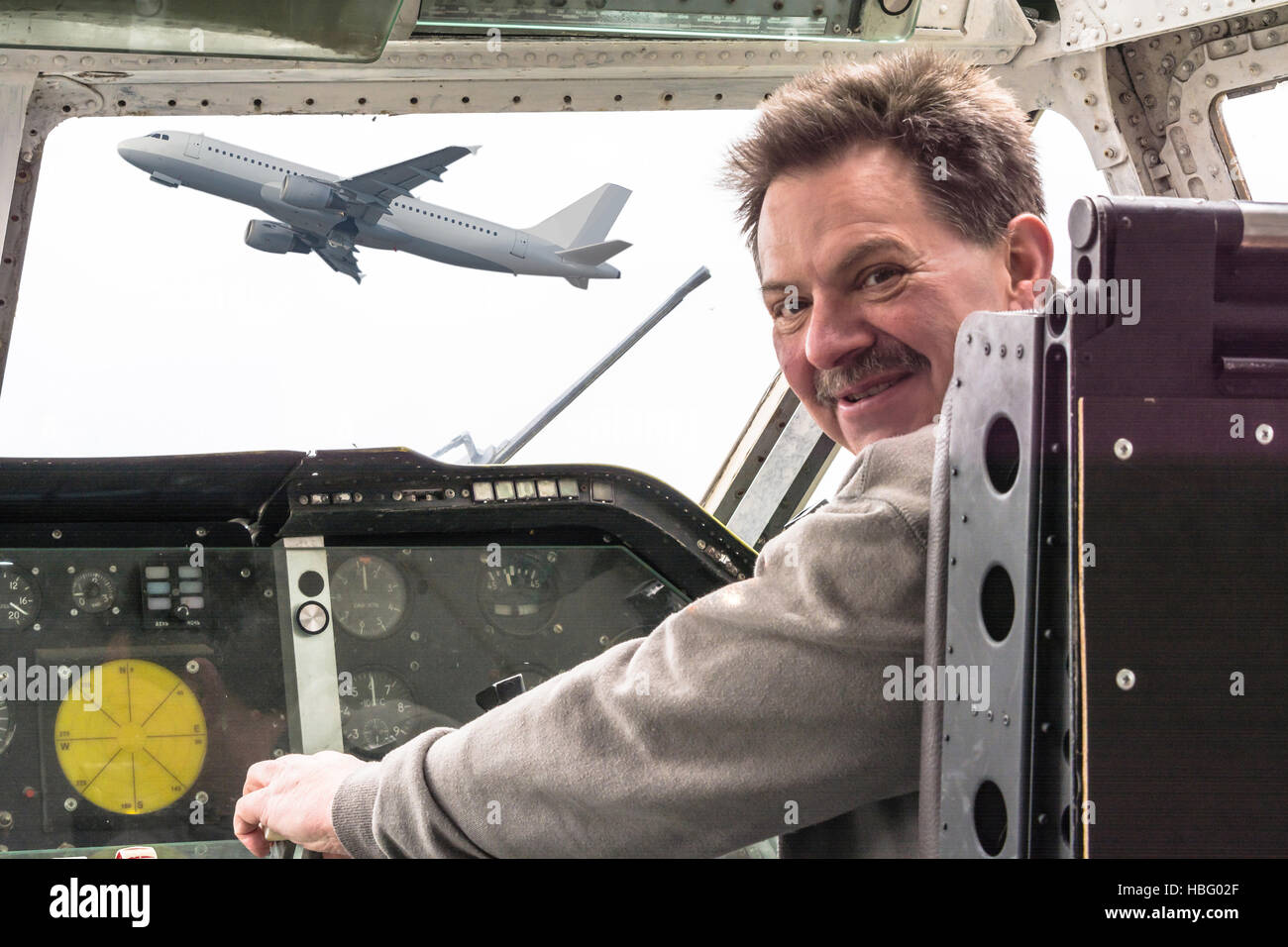 Man in aircraft cockpit Stock Photo - Alamy