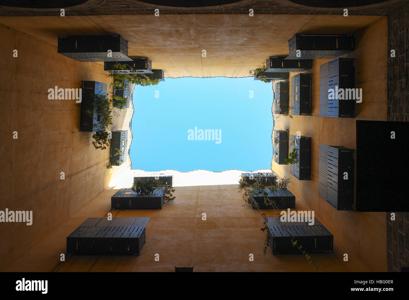 A courtyard - view looking to the sky Stock Photo - Alamy