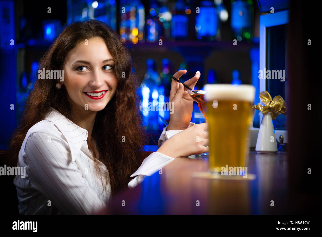 young woman in a bar Stock Photo - Alamy