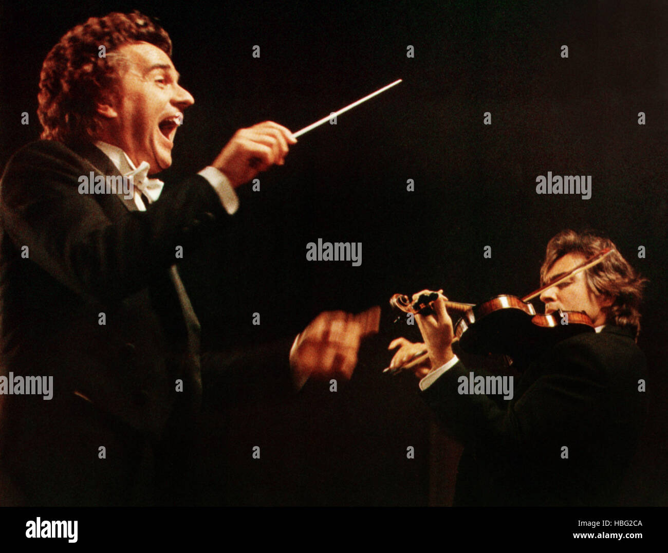 UNFAITHFULLY YOURS, from left: Dudley Moore, Armand Assante, 1984, TM ...
