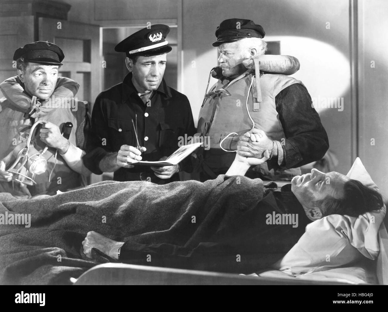 ACTION IN THE NORTH ATLANTIC, from left: Sam Levene, Humphrey Bogart ...