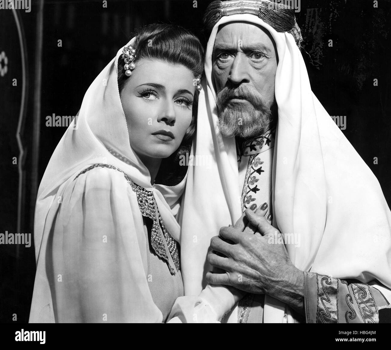 ACTION IN ARABIA, Lenore Aubert, H.B. Warner, 1944 Stock Photo - Alamy