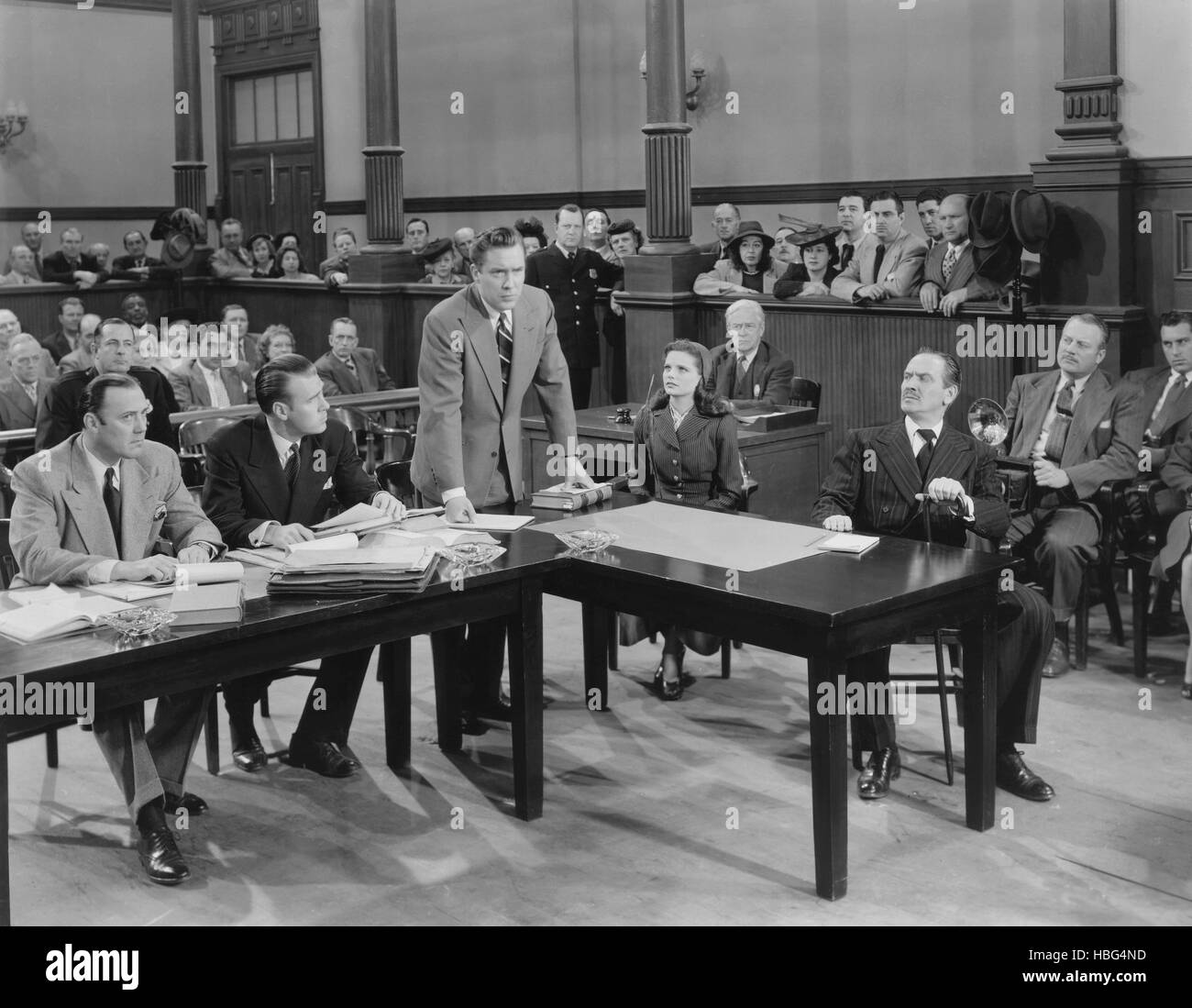 AN ACT OF MURDER, front from left: Edmond O'Brien (standing), Geraldine ...