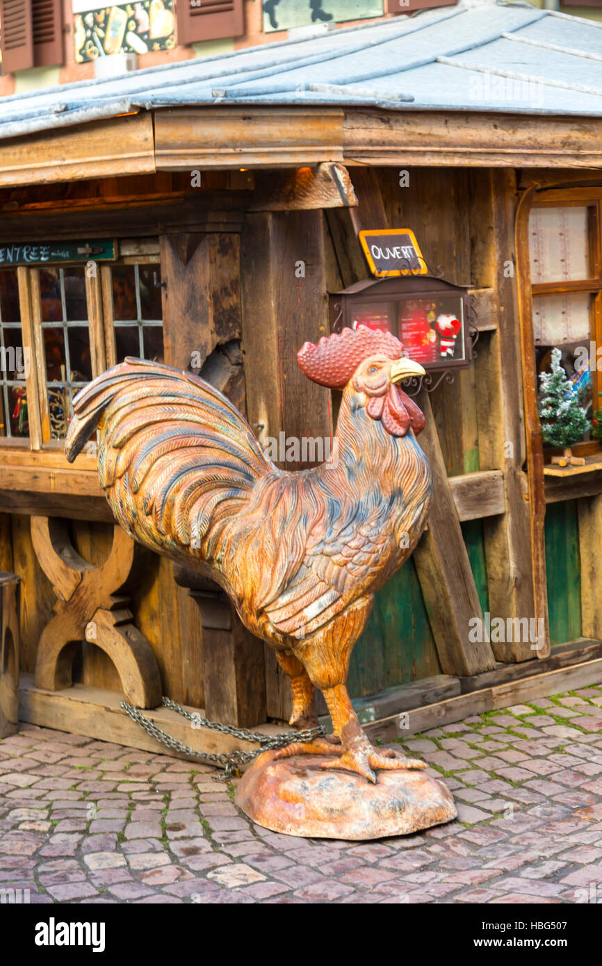 Ancient wooden rooster in the Petite Venice in Colmar, wine route ...