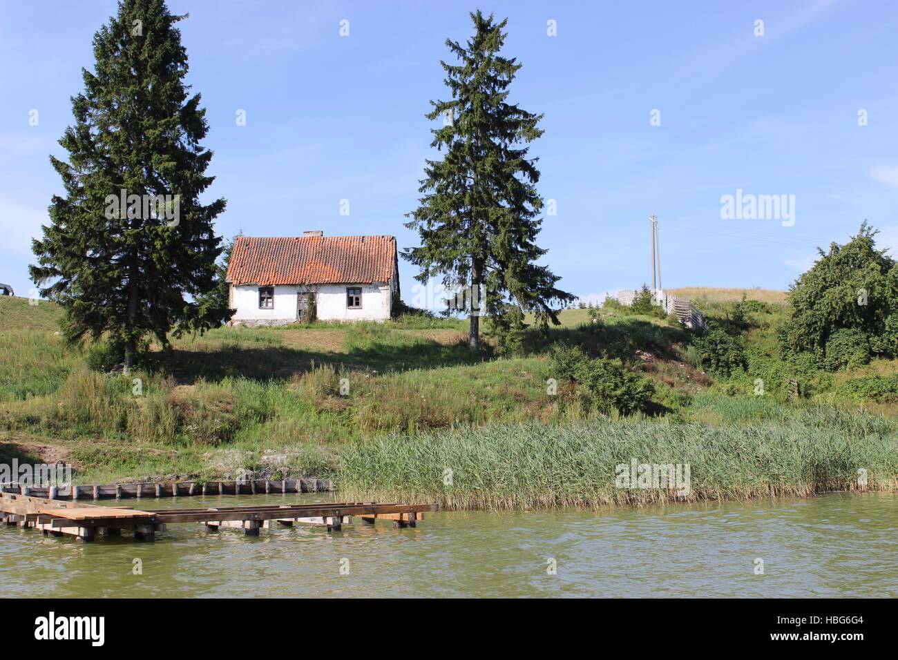 Old house at lake Stock Photo - Alamy