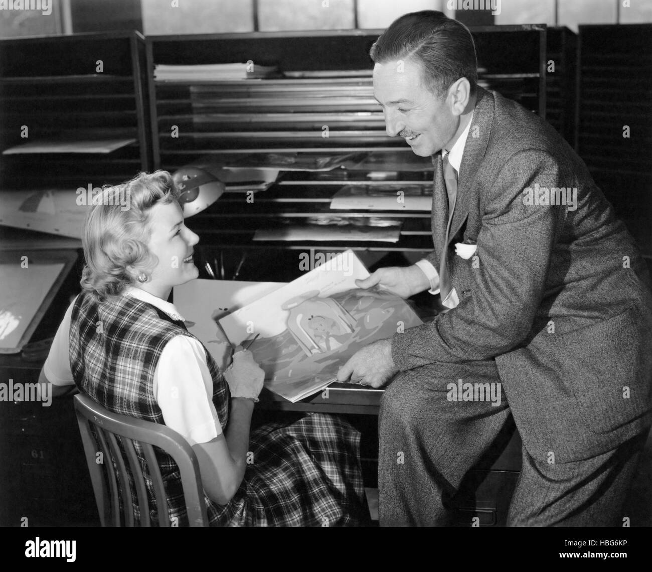 ALICE IN WONDERLAND, producer Walt Disney (right) examining ongoing ...