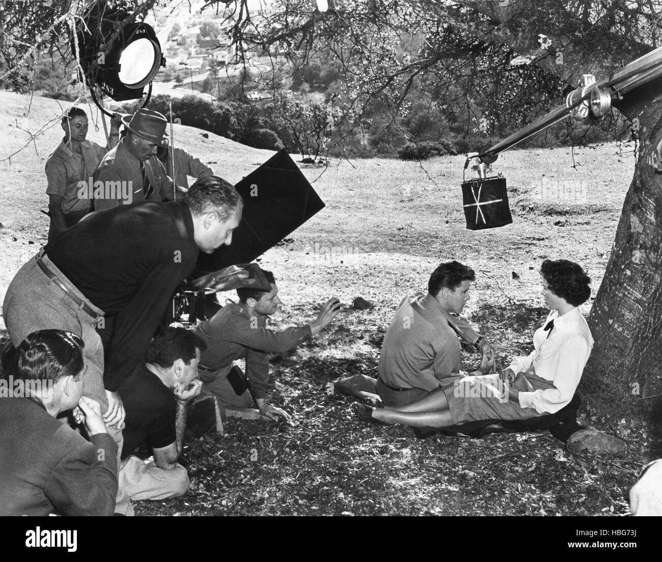 ALL MY SONS, from left, director Irving Reis, (kneeling, in black polo ...