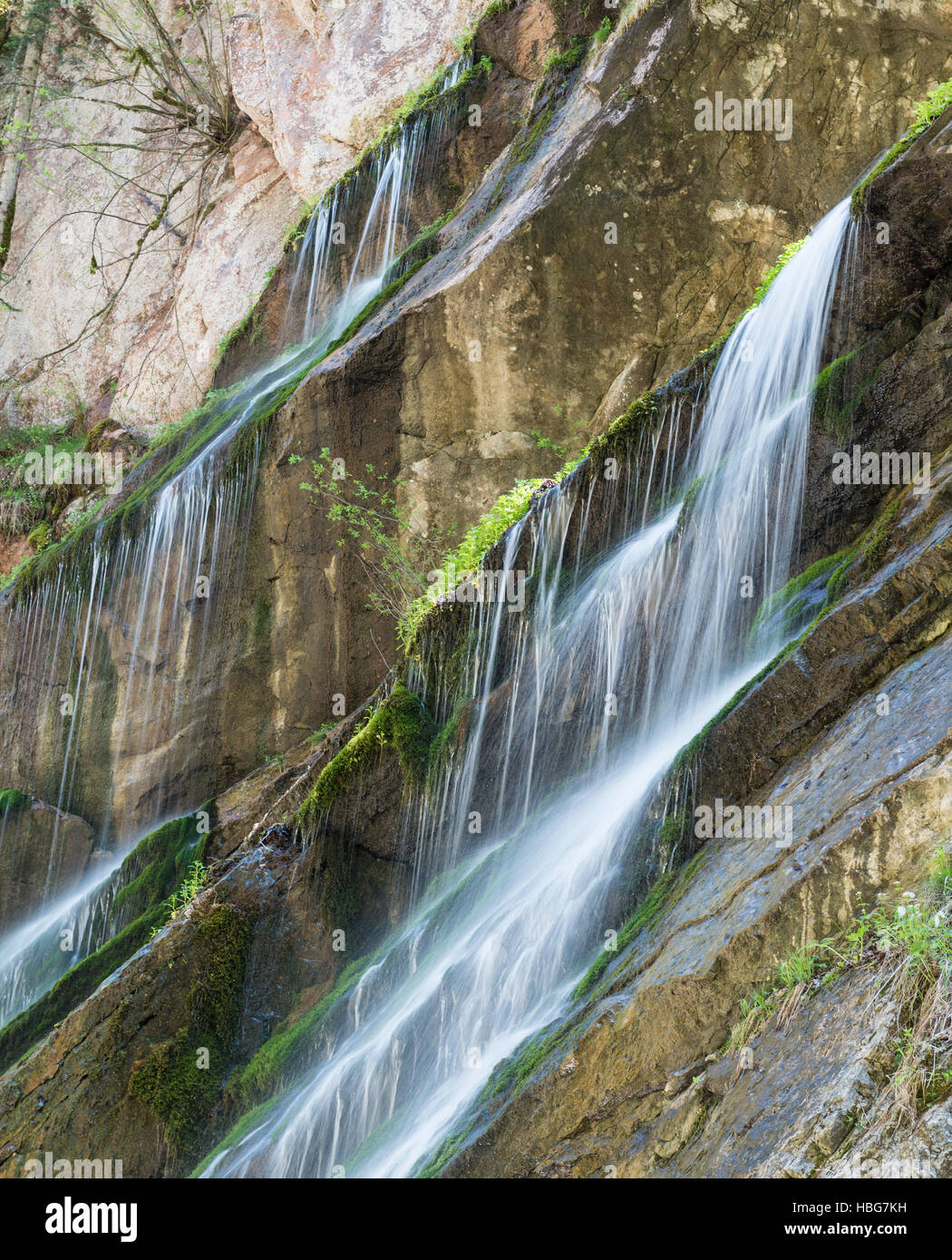 Waterfall on mossy slope in gorge, Wimbachklamm, Wimbachtal, Ramsau bei ...