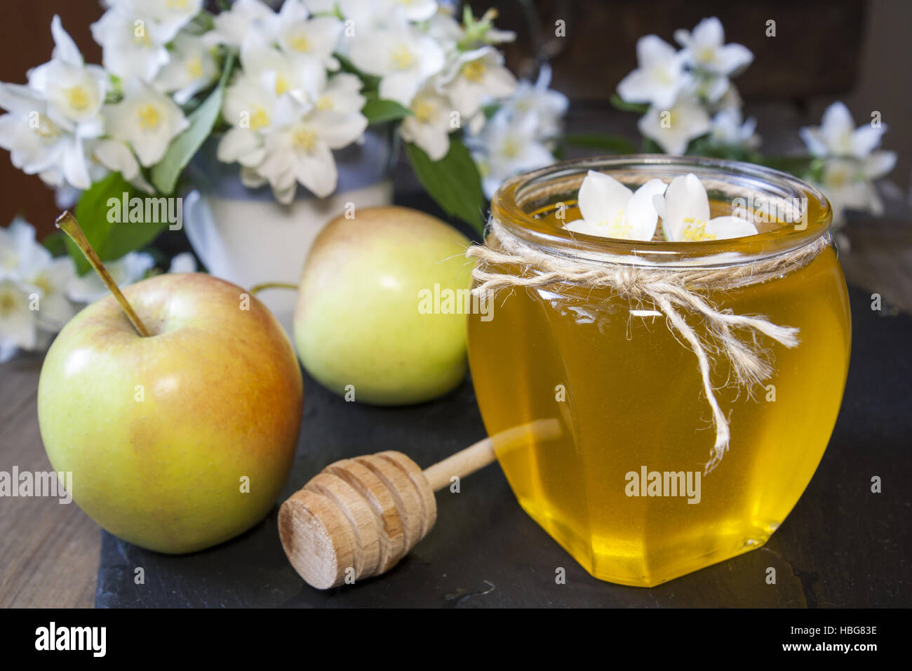 Delicious fresh spring honey in glass jar Stock Photo - Alamy