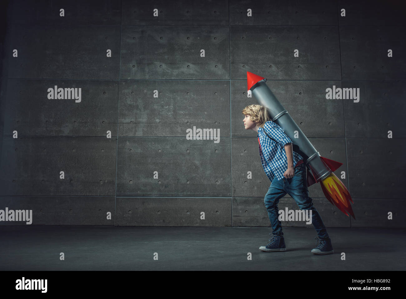 Boy with rocket Stock Photo - Alamy