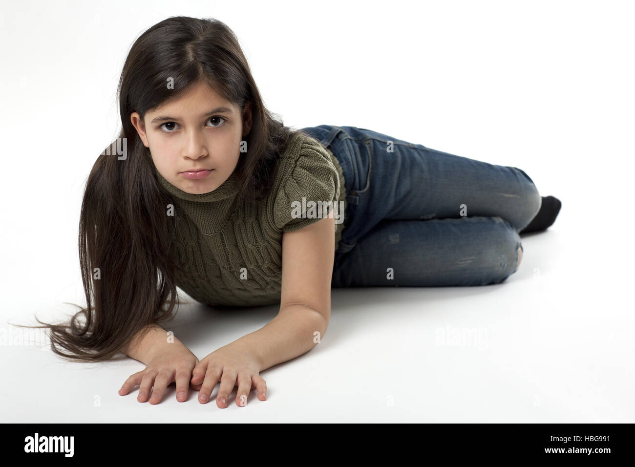 Serious looking young girl Stock Photo - Alamy
