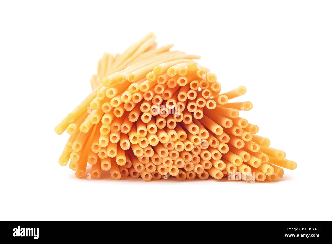 spaghetti bucatini pasta studio isolated Stock Photo - Alamy