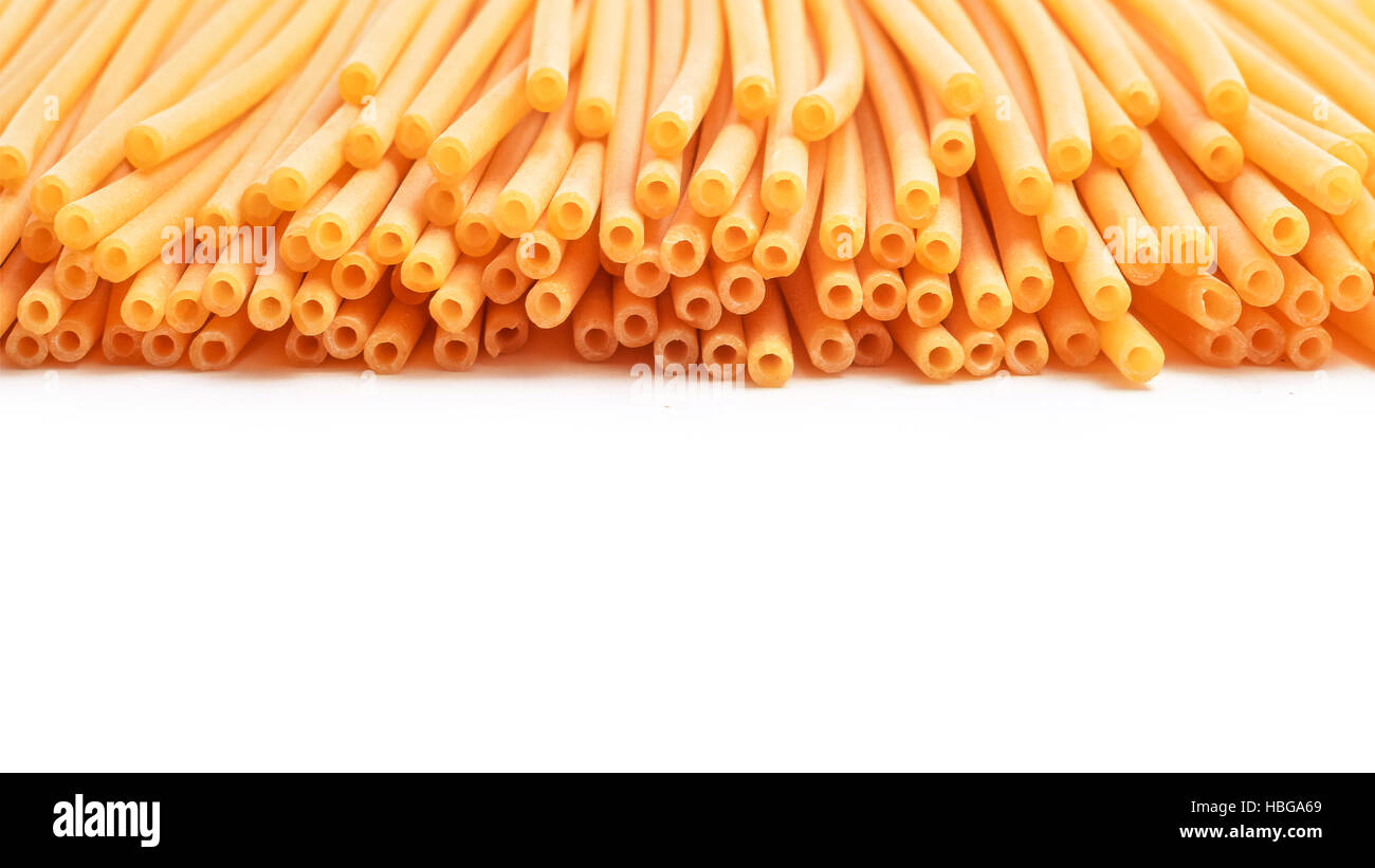 spaghetti bucatini pasta studio isolated Stock Photo - Alamy