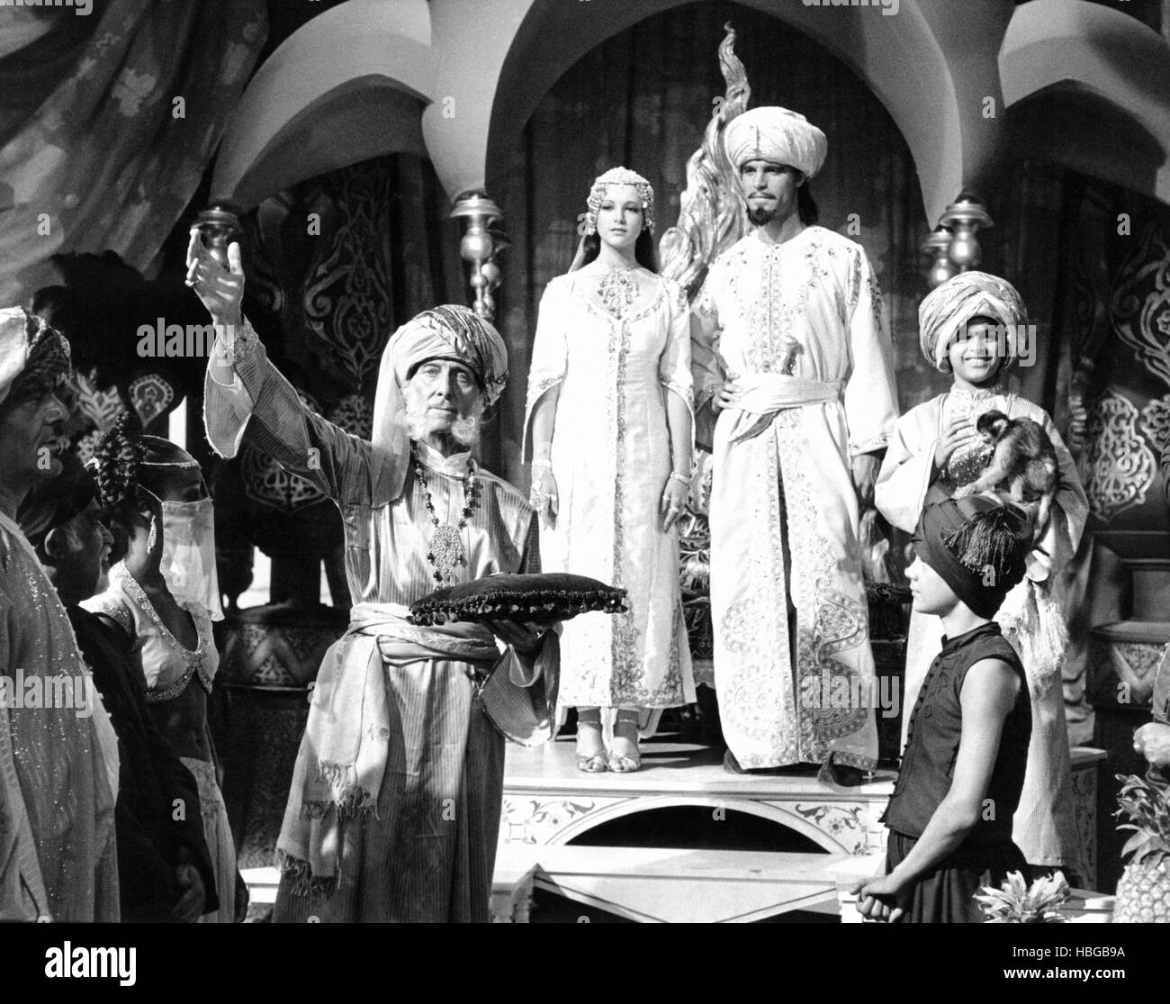 ARABIAN ADVENTURE, from left: Peter Cushing, Emma Samms, Oliver Tobias ...