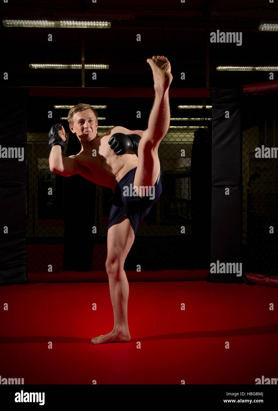 Training of young kickboxer at gym Stock Photo - Alamy