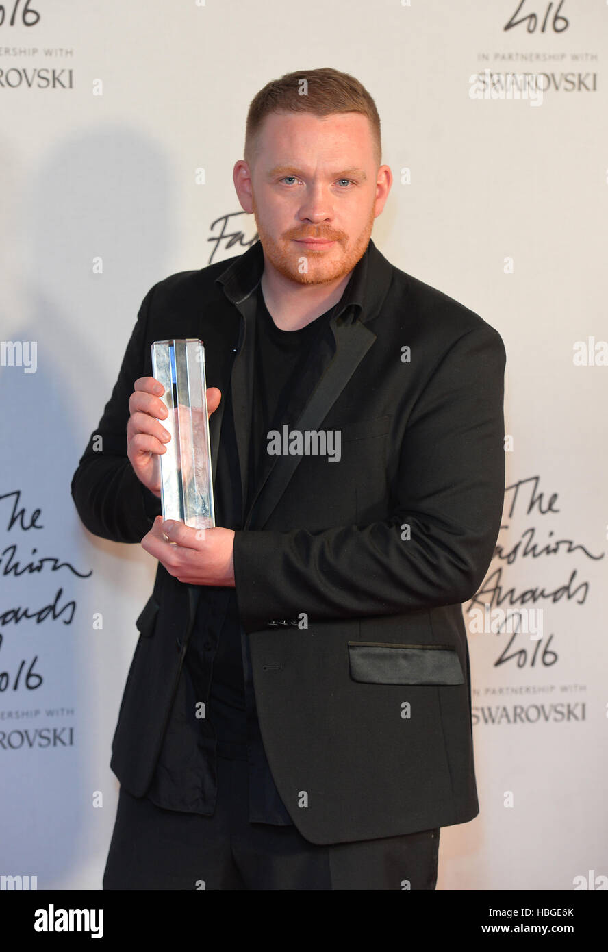 Craig Green with his award for British Menswear Designer in the press ...