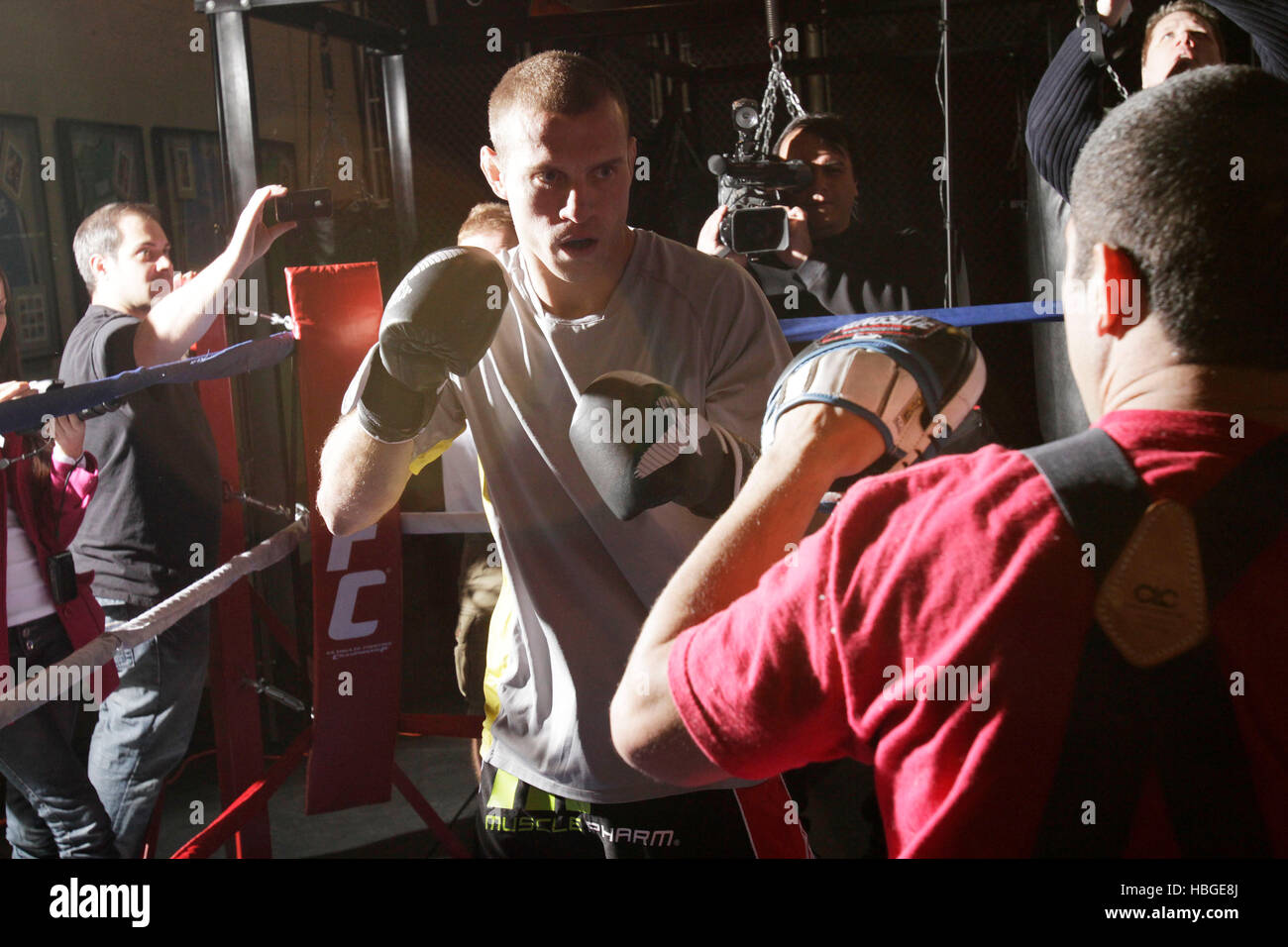 UFC fighter Donald Cerrone (grey shirt), works out for the media before ...