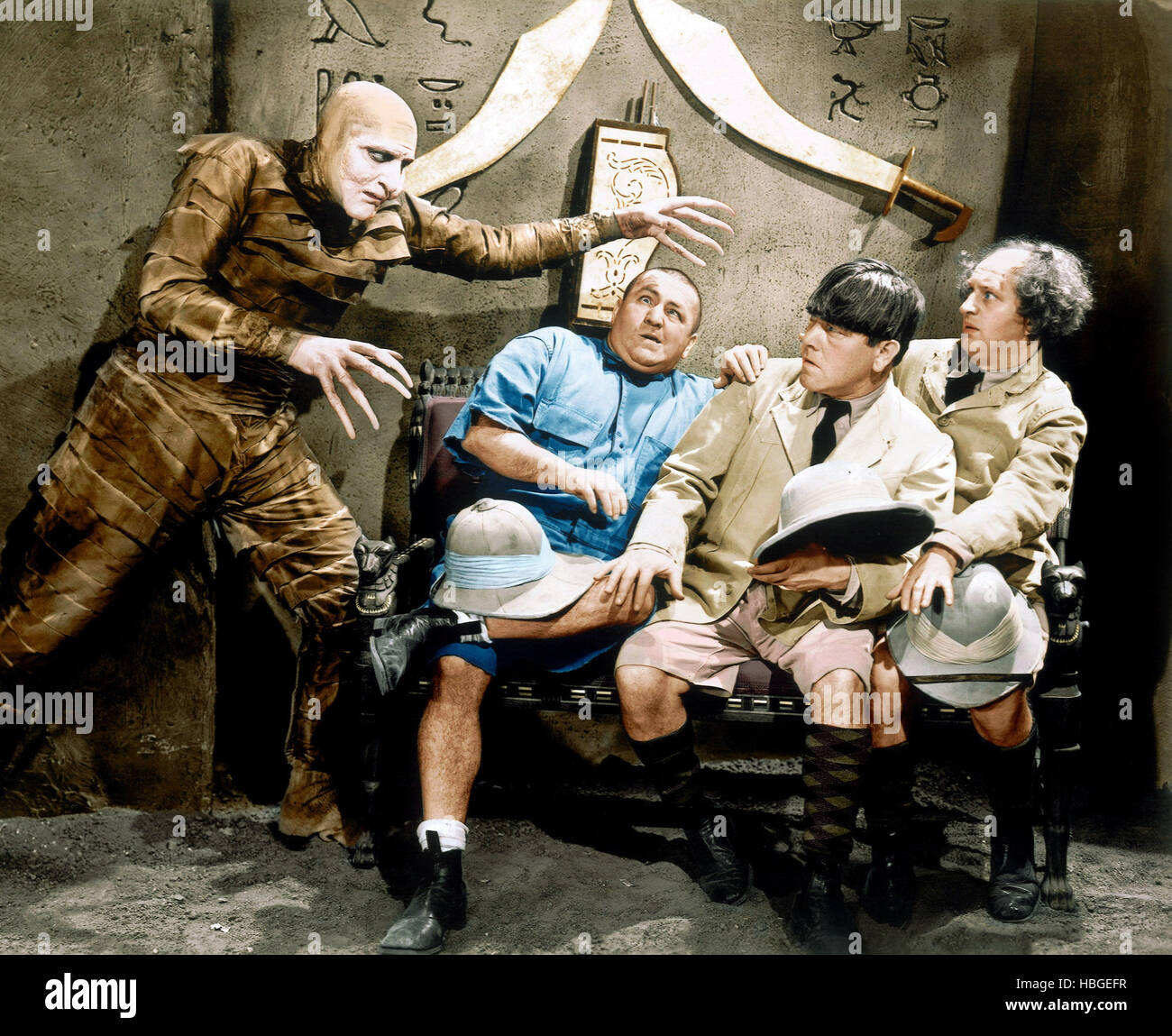 WE WANT OUR MUMMY, from left: Theodore Lorch, Curly Howard, Moe Howard ...
