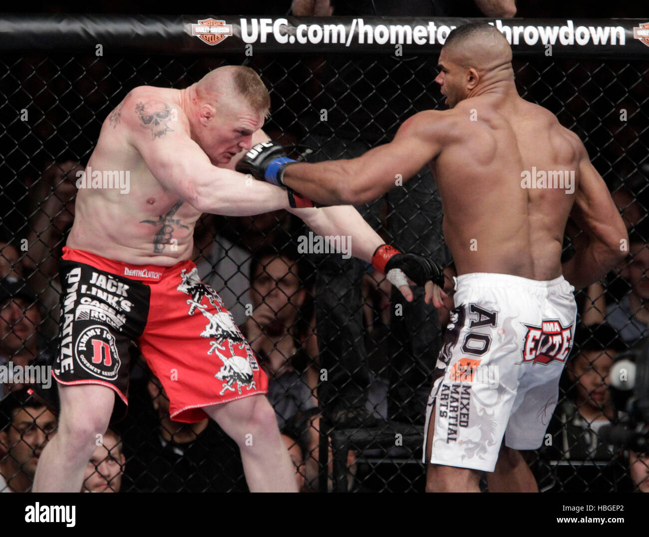 UFC fighters Brock Lesnar, left, and Alistair Overeem fight at UFC 141 ...