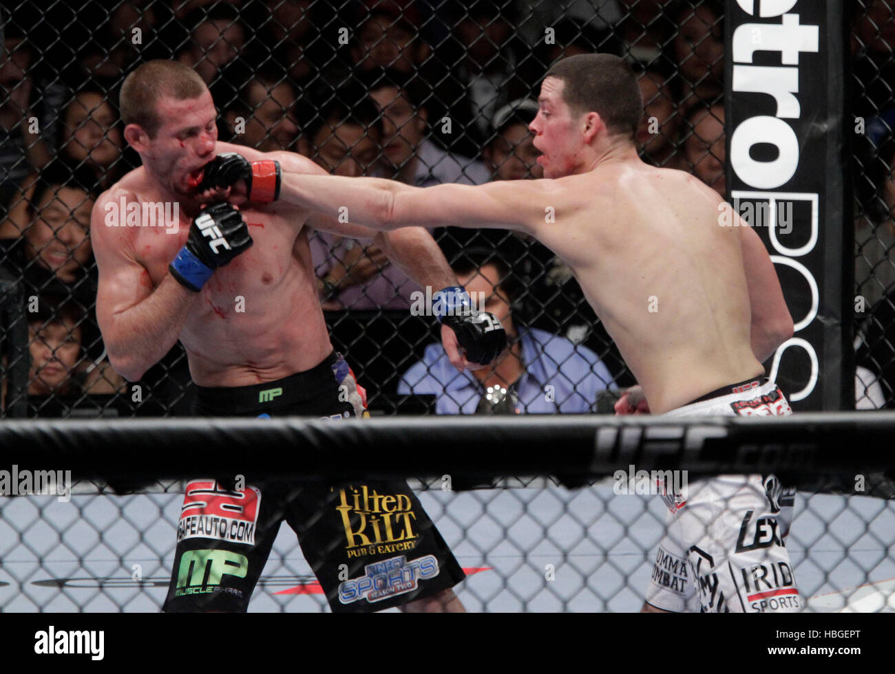 UFC fighter Nate Diaz, right, fights Donald Cerrone at UFC 141 at the ...