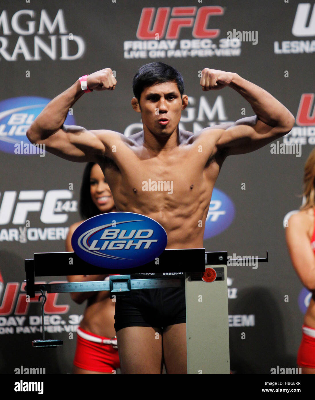 UFC fighter Nam Phan square off at the weigh-ins for UFC 141 at the MGM ...