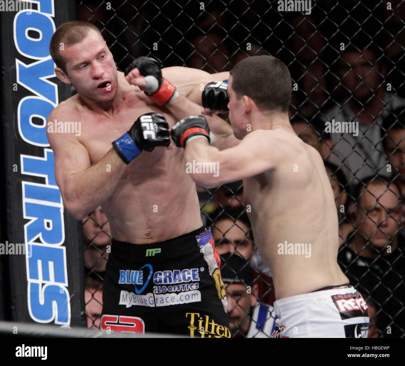 UFC fighter Nate Diaz, right, fights Donald Cerrone at UFC 141 at the ...