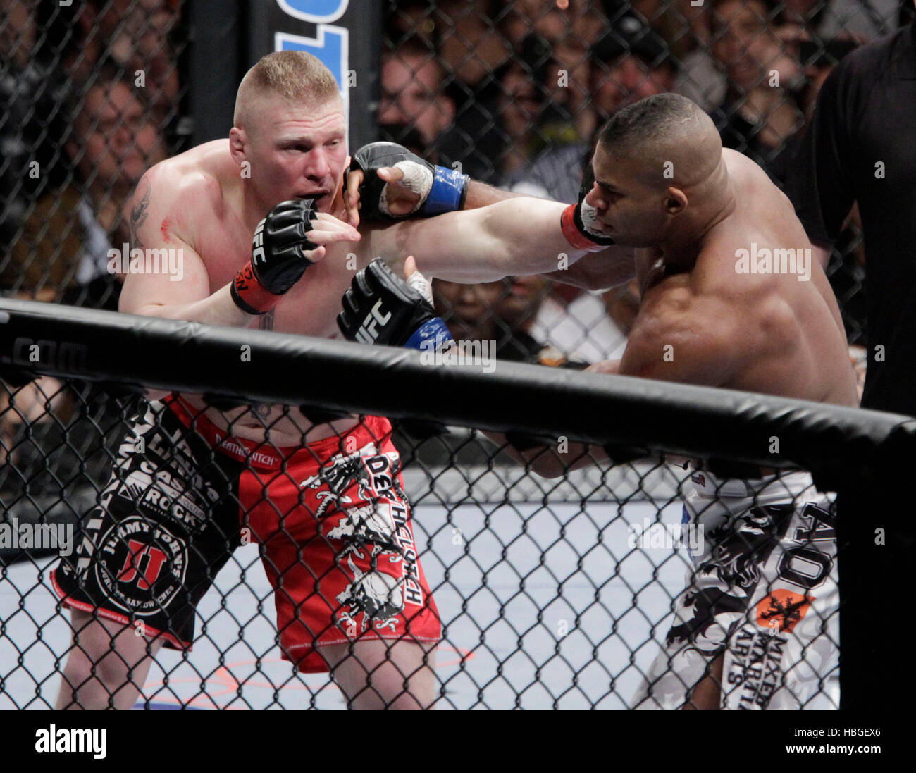 UFC fighters Brock Lesnar, left, and Alistair Overeem fight at UFC 141 ...
