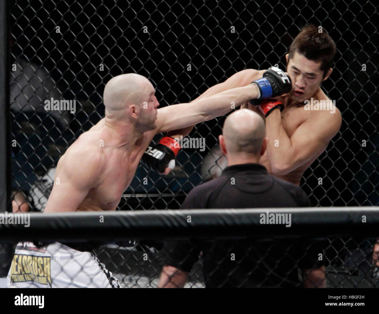 UFC fighter Kim Dong-Hyun, right, fights Sean Pierson at UFC 141 at the ...