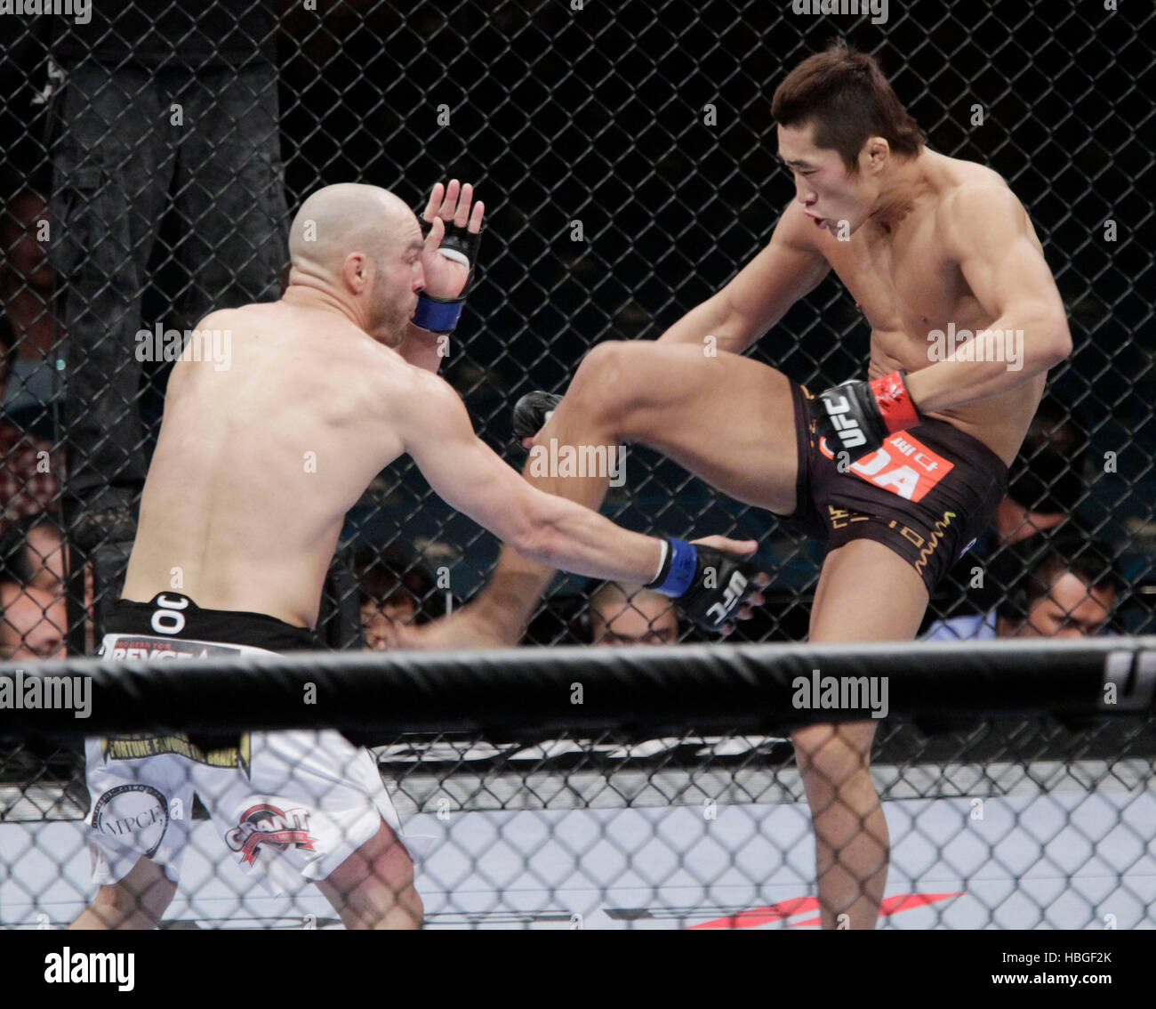 UFC fighter Kim Dong-Hyun, right, fights Sean Pierson at UFC 141 at the ...
