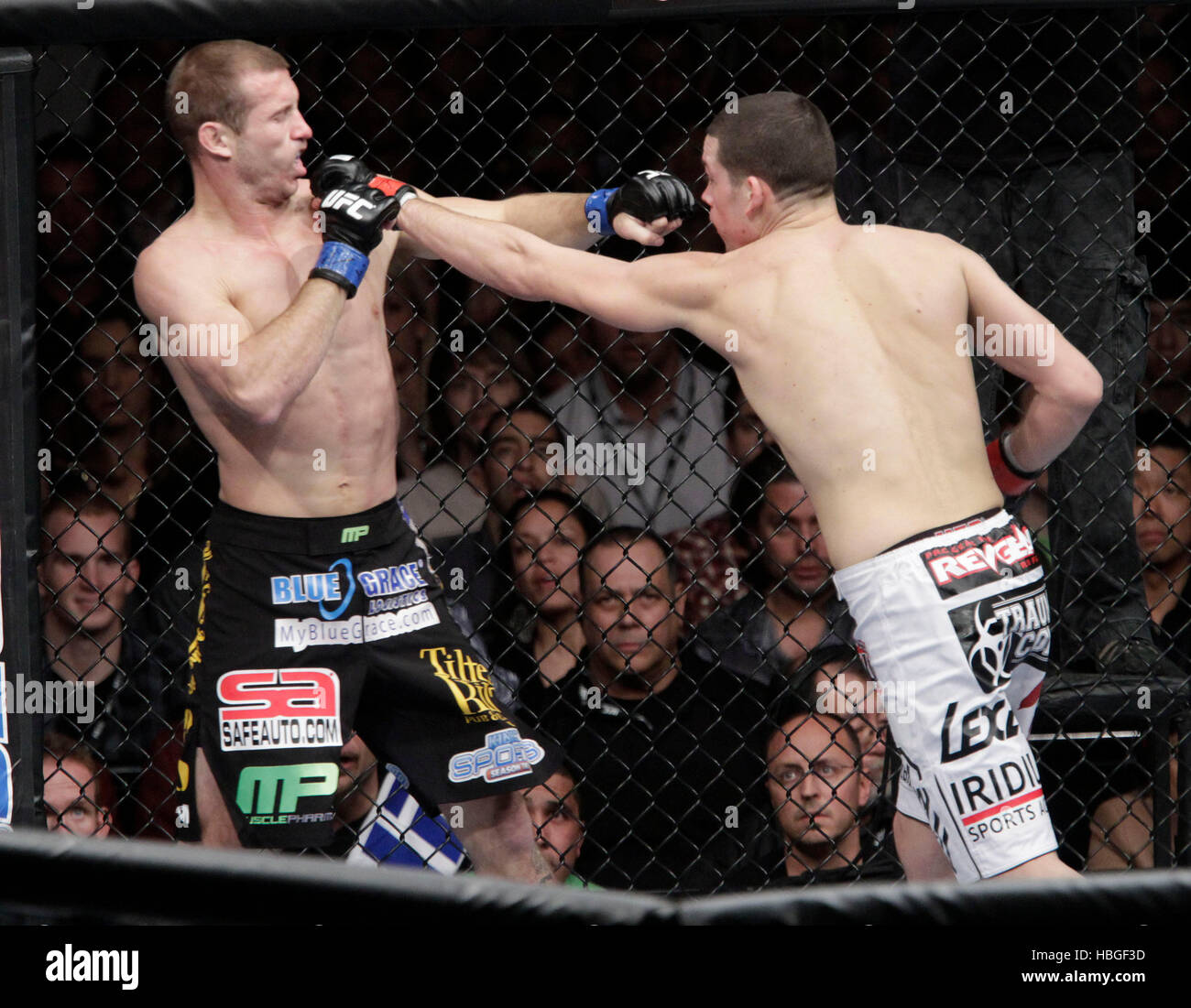 UFC fighter Nate Diaz, right, fights Donald Cerrone at UFC 141 at the ...