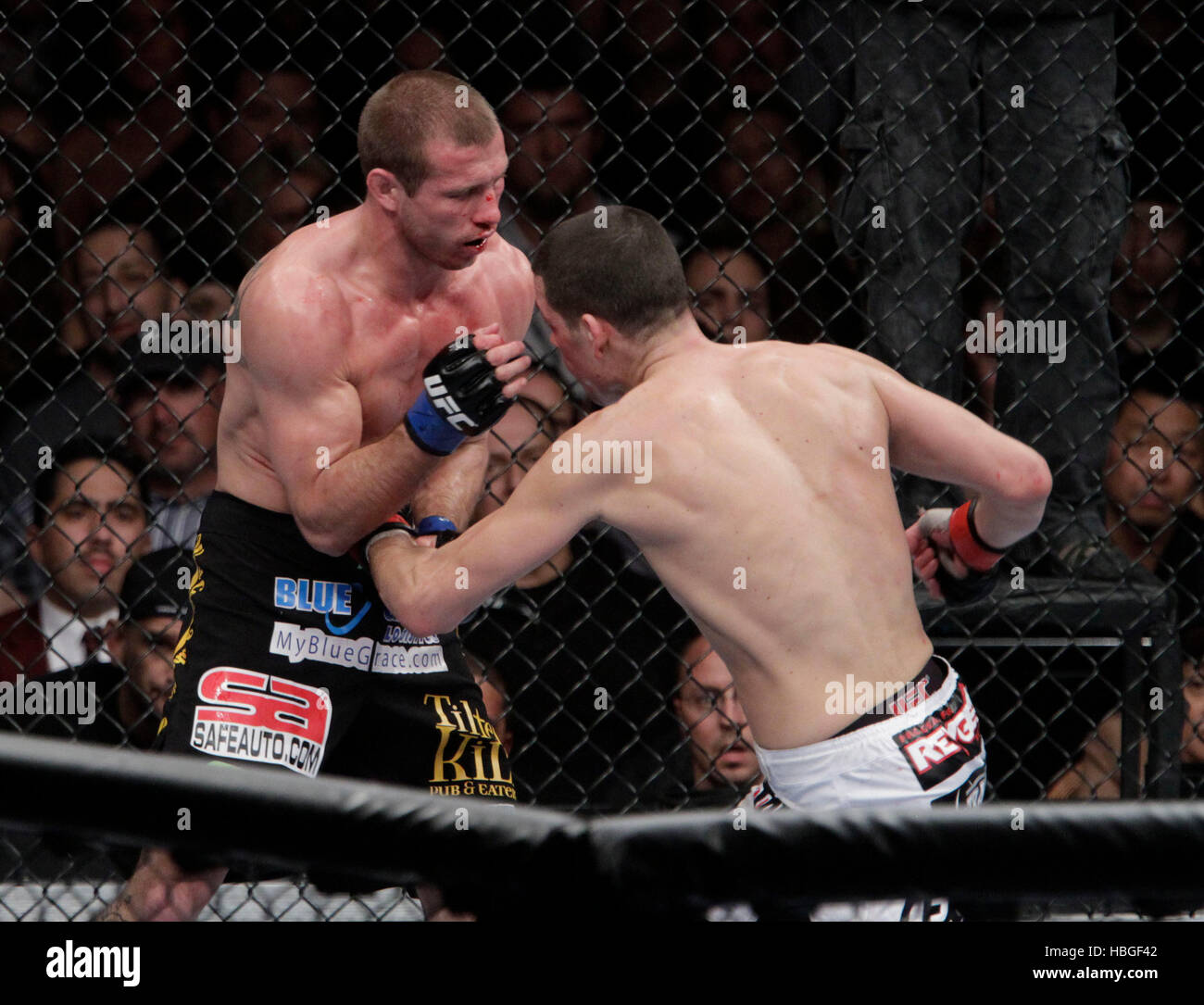 UFC fighter Nate Diaz, right, fights Donald Cerrone at UFC 141 at the ...