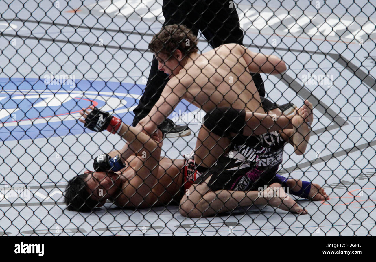 UFC fighter Jim Hettes, top, fights Nam Phan at UFC 141 at the MGM ...