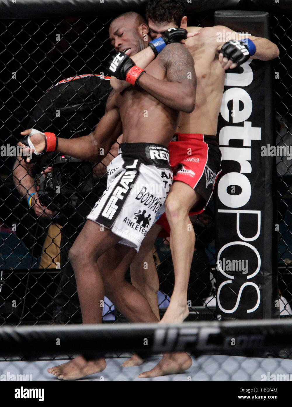 UFC fighter Danny Castillo, right, fights Anthony Njokuani at UFC 141 ...
