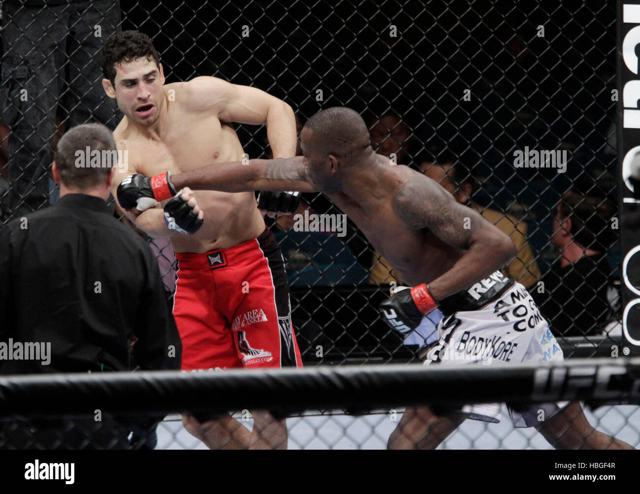 UFC fighter Danny Castillo, left, fights Anthony Njokuani at UFC 141 at ...