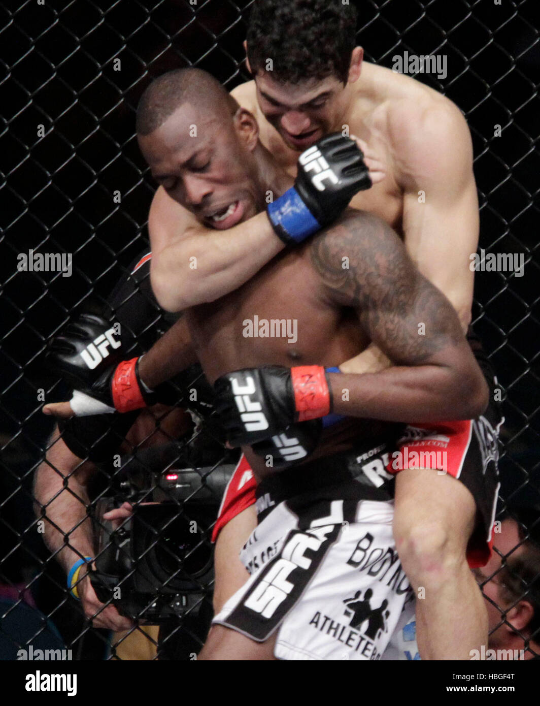 UFC fighter Danny Castillo, right, fights Anthony Njokuani at UFC 141 ...