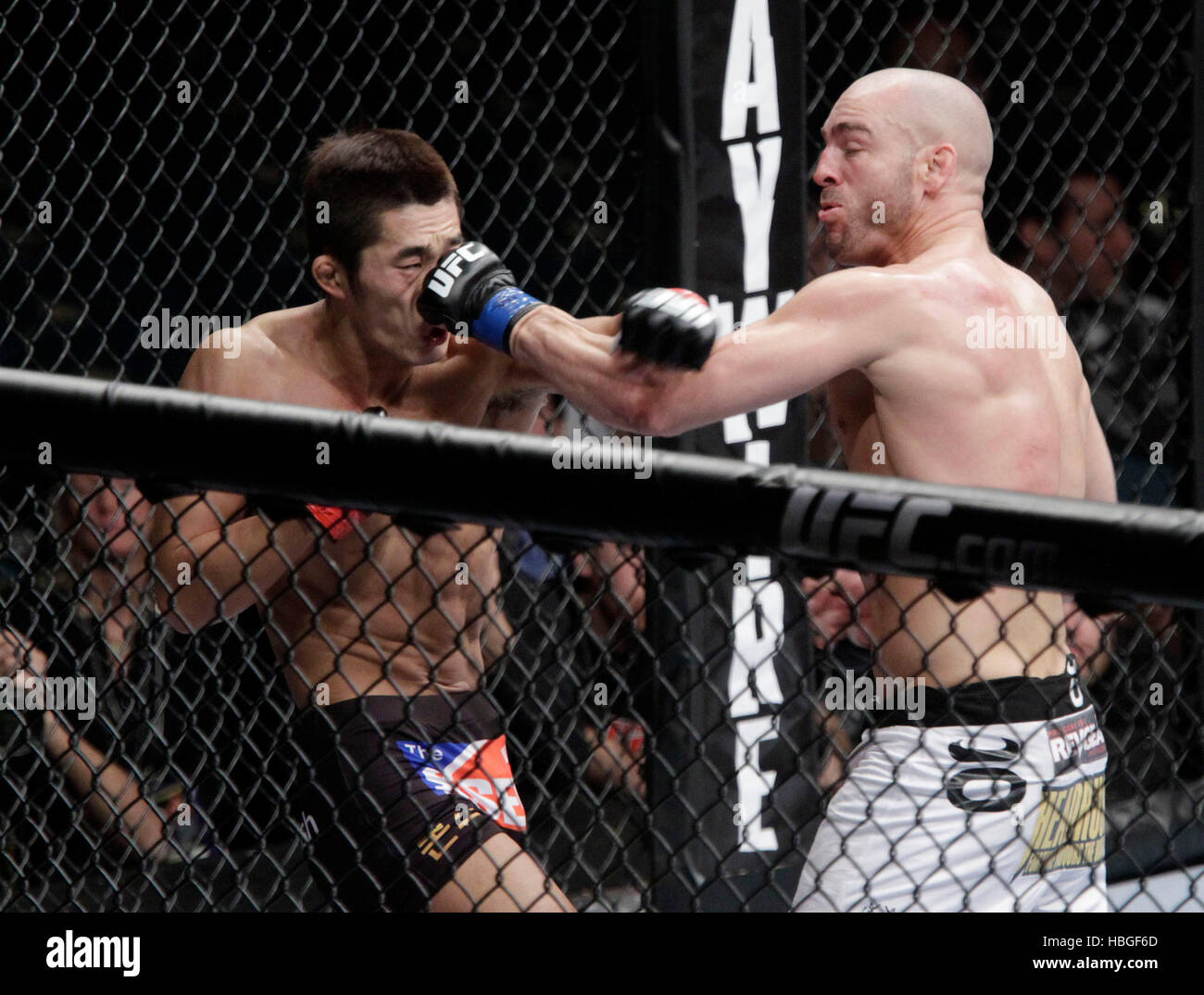 UFC fighter Kim Dong-Hyun, left, fights Sean Pierson at UFC 141 at the ...