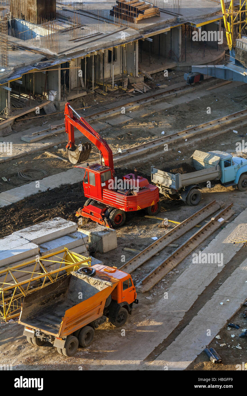 Machines working on a building site Stock Photo - Alamy