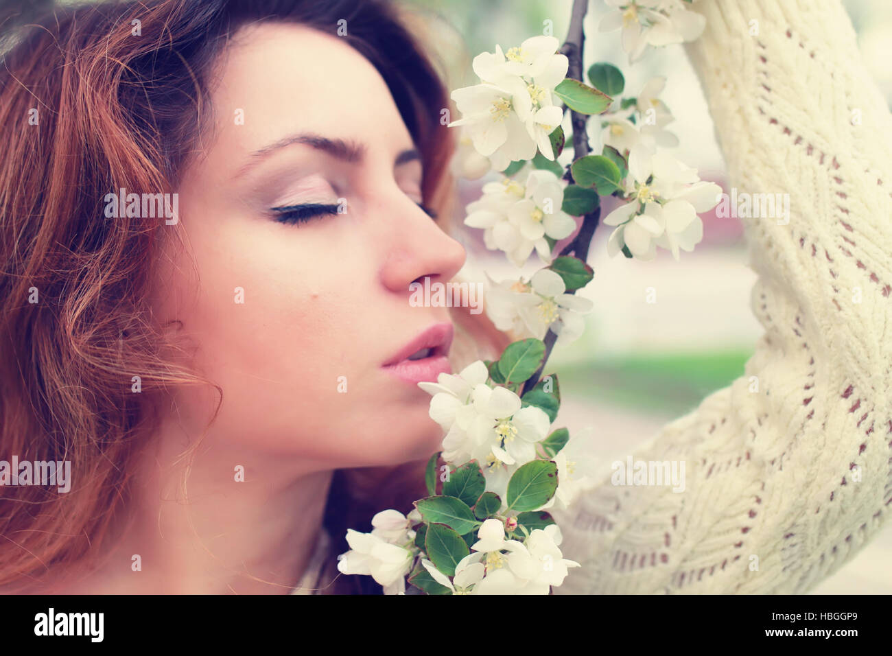 girl smell tree flower Stock Photo - Alamy