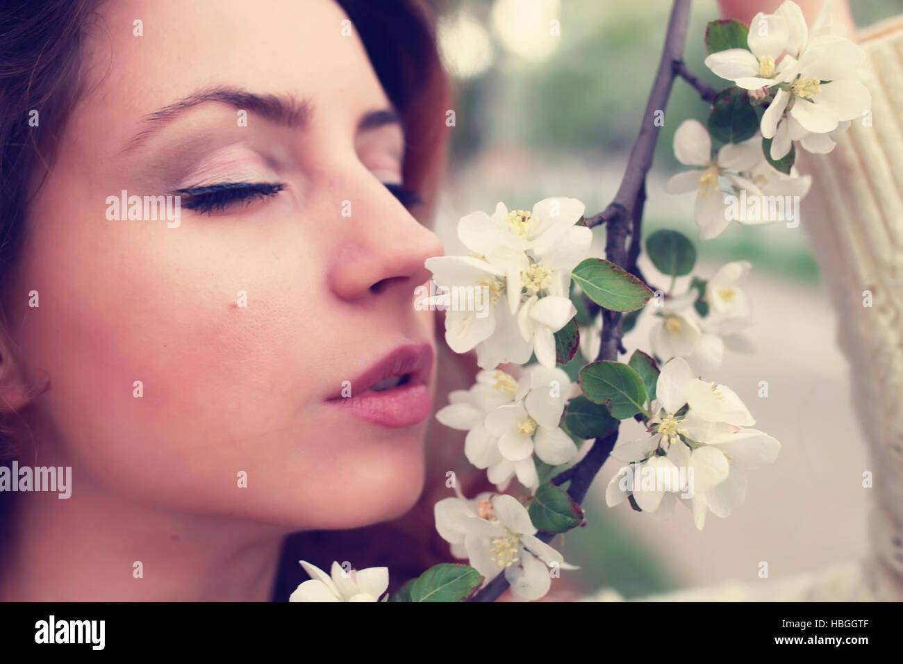 girl smell tree flower Stock Photo - Alamy