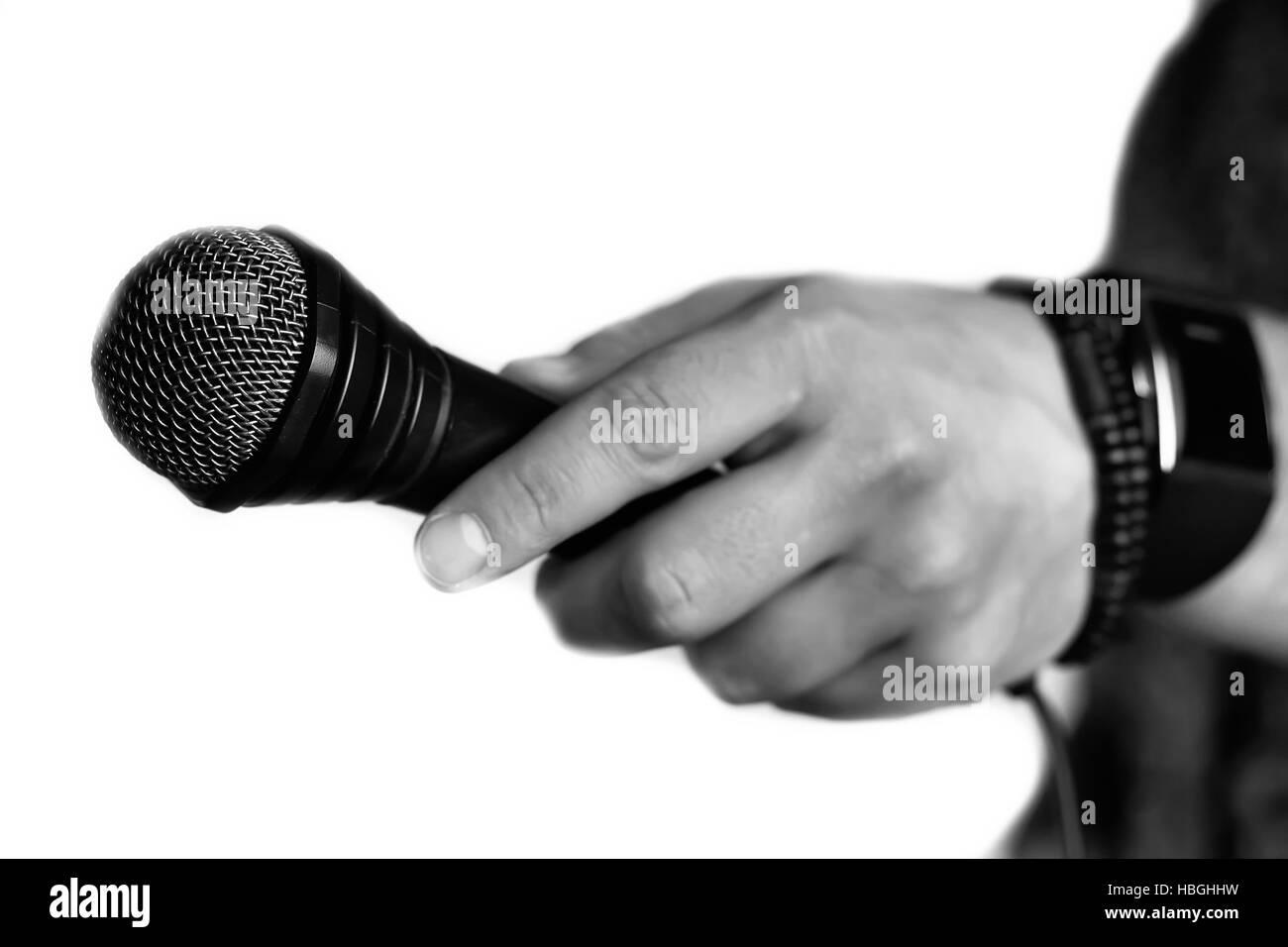 Microphone isolated man hand Stock Photo - Alamy
