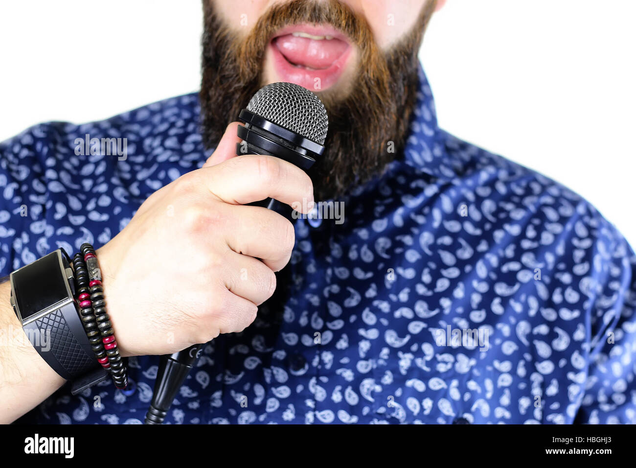 microphone on stage hand hold Stock Photo - Alamy