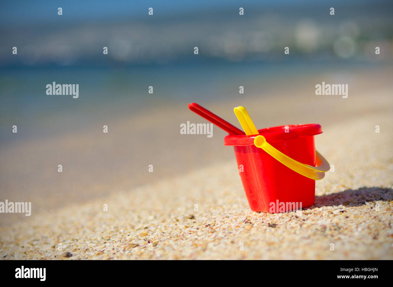 Red sand bucket hi-res stock photography and images - Alamy