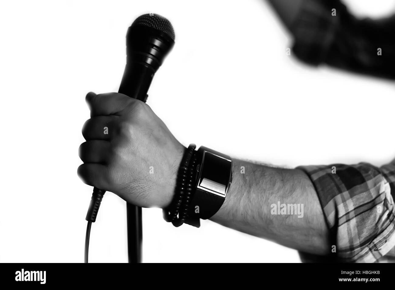 Microphone isolated man hand Stock Photo - Alamy